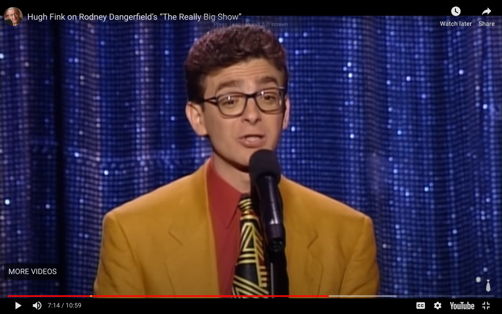 "What Time Is It There?" a comedy routine by Hugh Fink - Retrospect